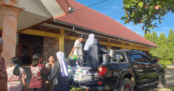 Mass and Humanitarian Aid Bring Consolation to Isolated, Flood-Hit ...